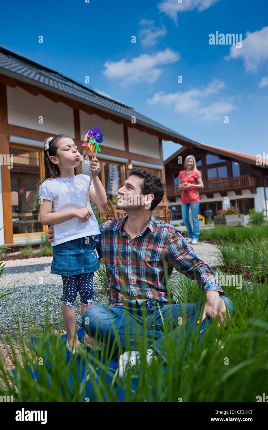 Family in front of Lehner energy house, Poing, Bavaria, Germany, Europe ...