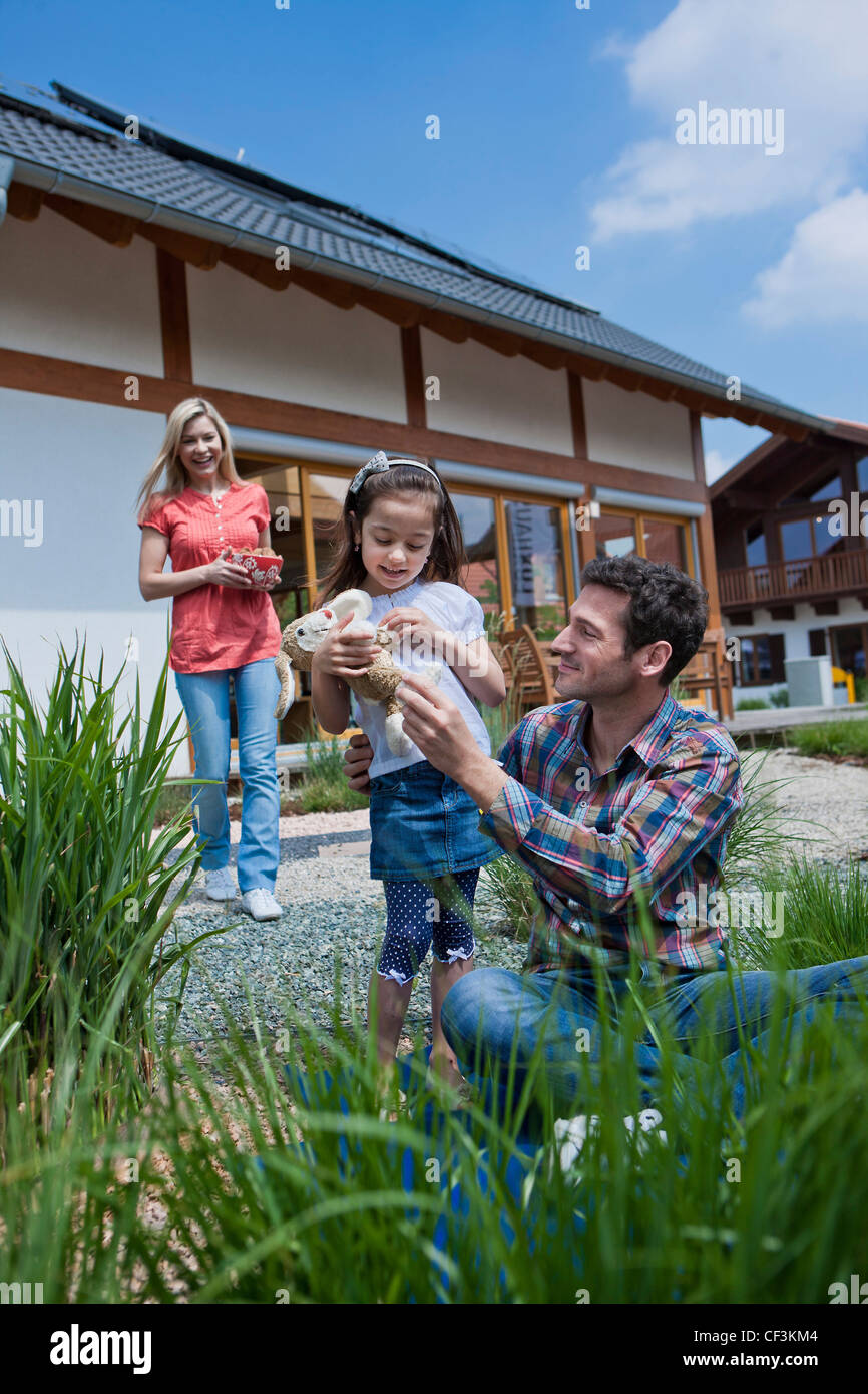 Family in front of Lehner energy house, Poing, Bavaria, Germany, Europe ...