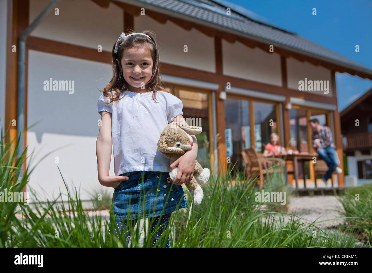 Family in front of Lehner energy house, Poing, Bavaria, Germany, Europe ...