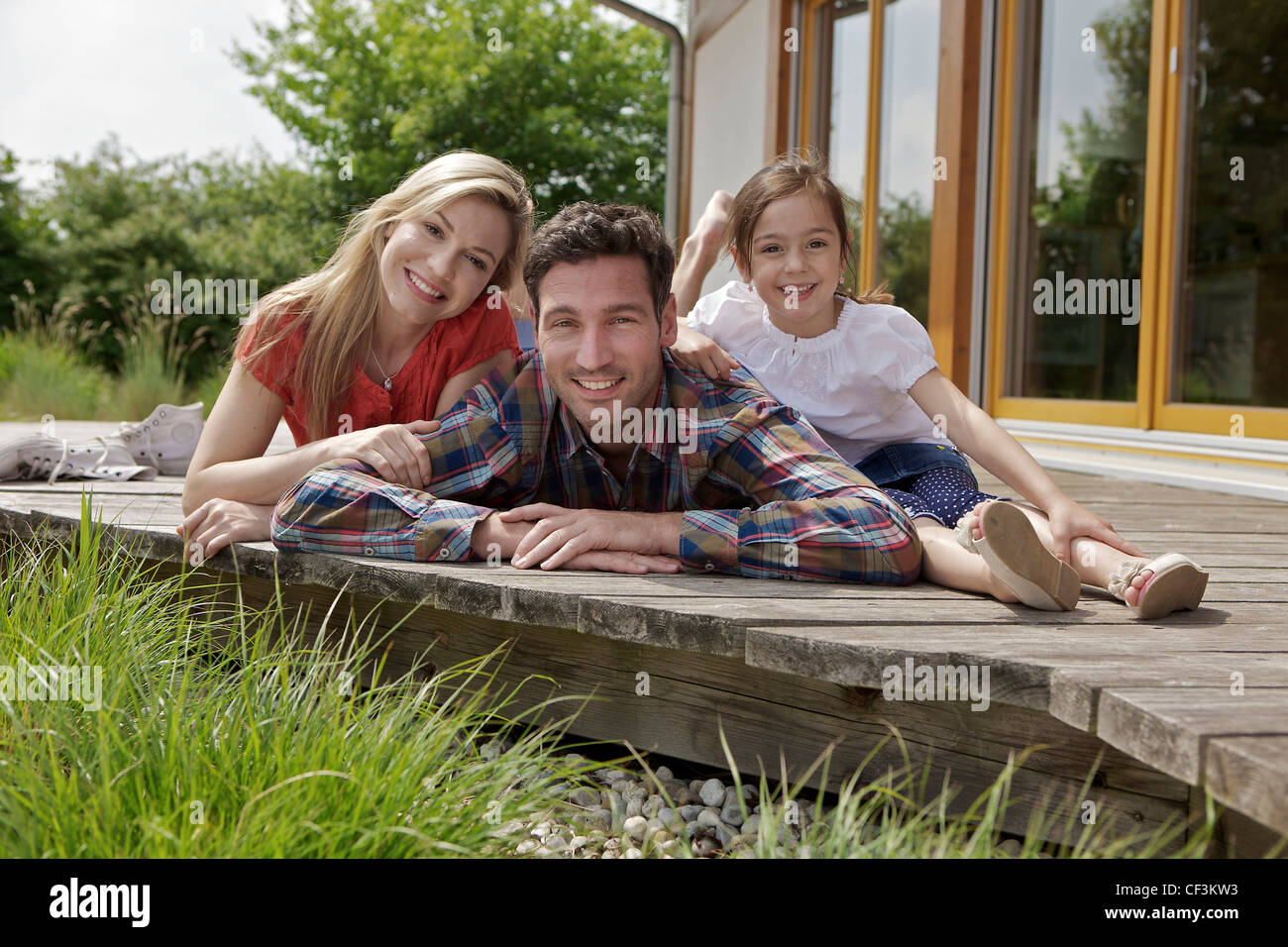 Family in front of Lehner energy house, Poing, Bavaria, Germany, Europe ...