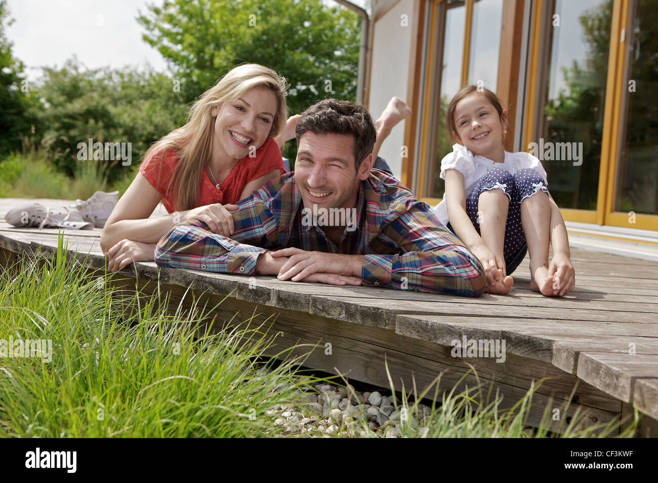Family in front of Lehner energy house, Poing, Bavaria, Germany, Europe ...