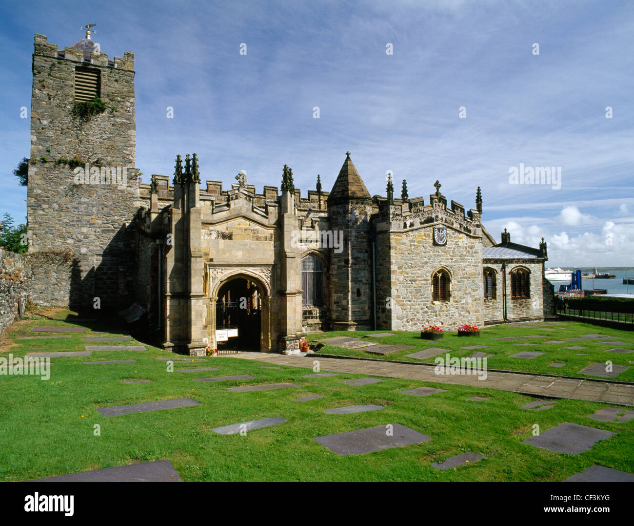 Exterior view of St Cybi's church built on to the wall of Caer Gybi ...