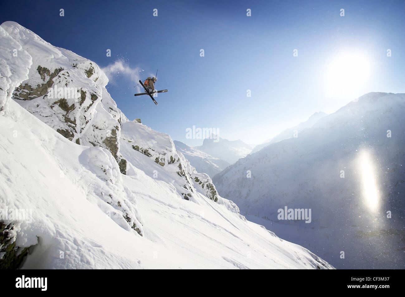 Skier doing a jump Stock Photo - Alamy