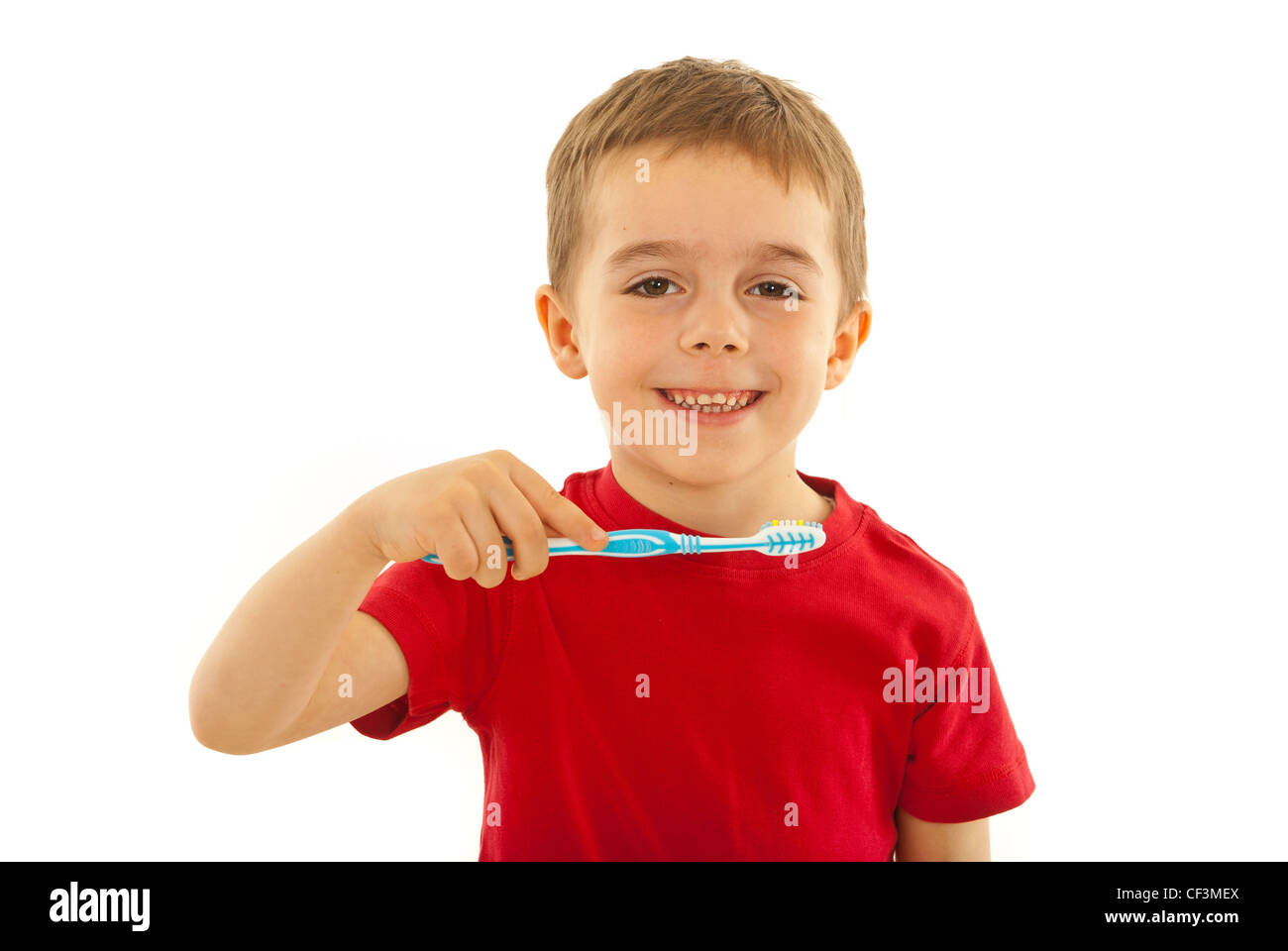 Happy kid with toothy smile holding toothbrush isolate don white ...