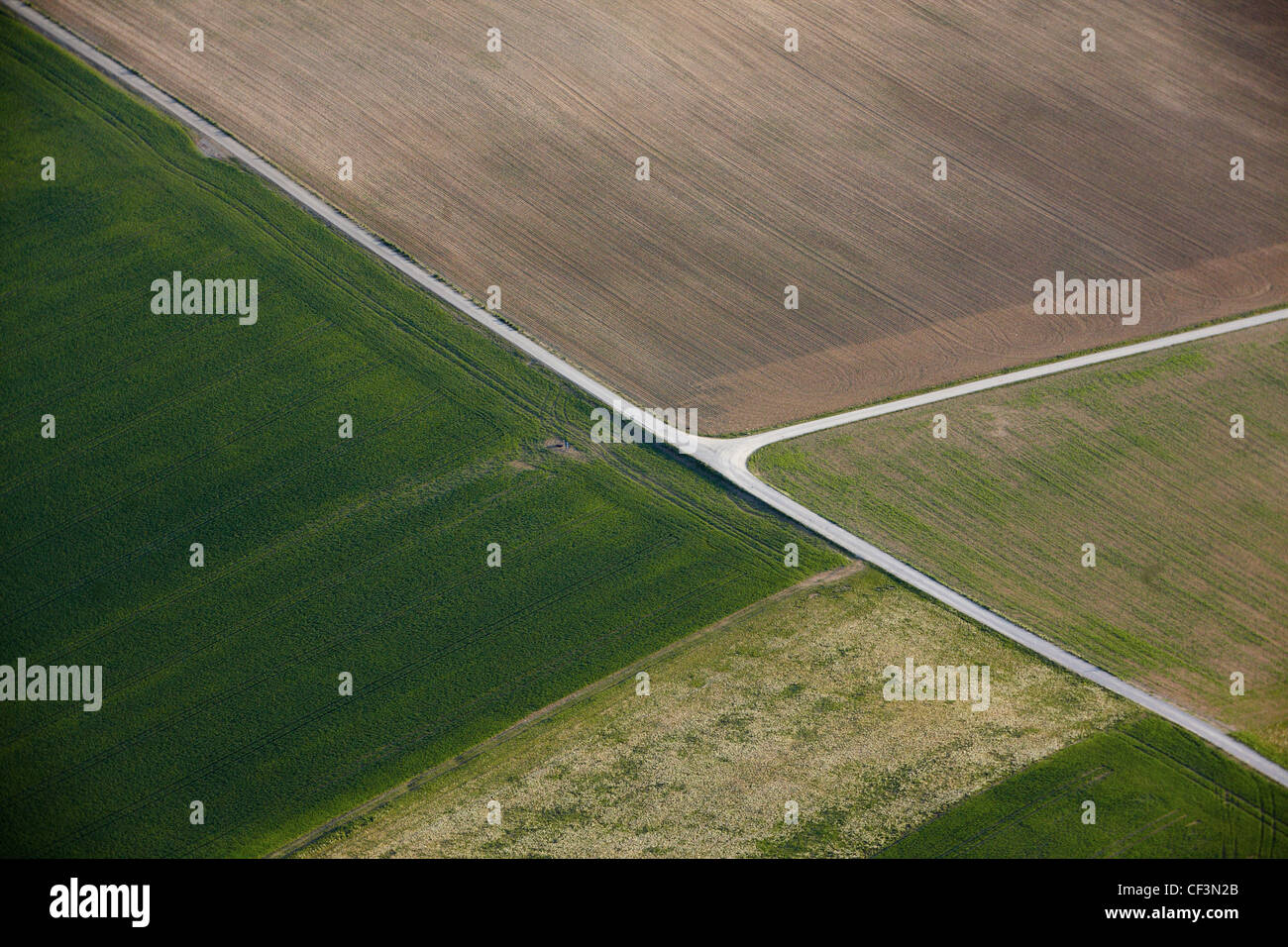 Tractor tracks on field Stock Photo - Alamy