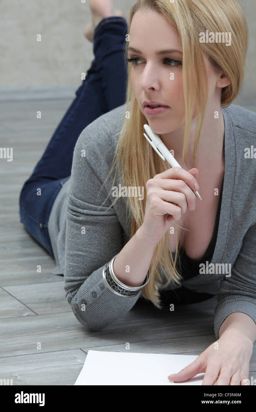 Young woman writing a letter Stock Photo - Alamy