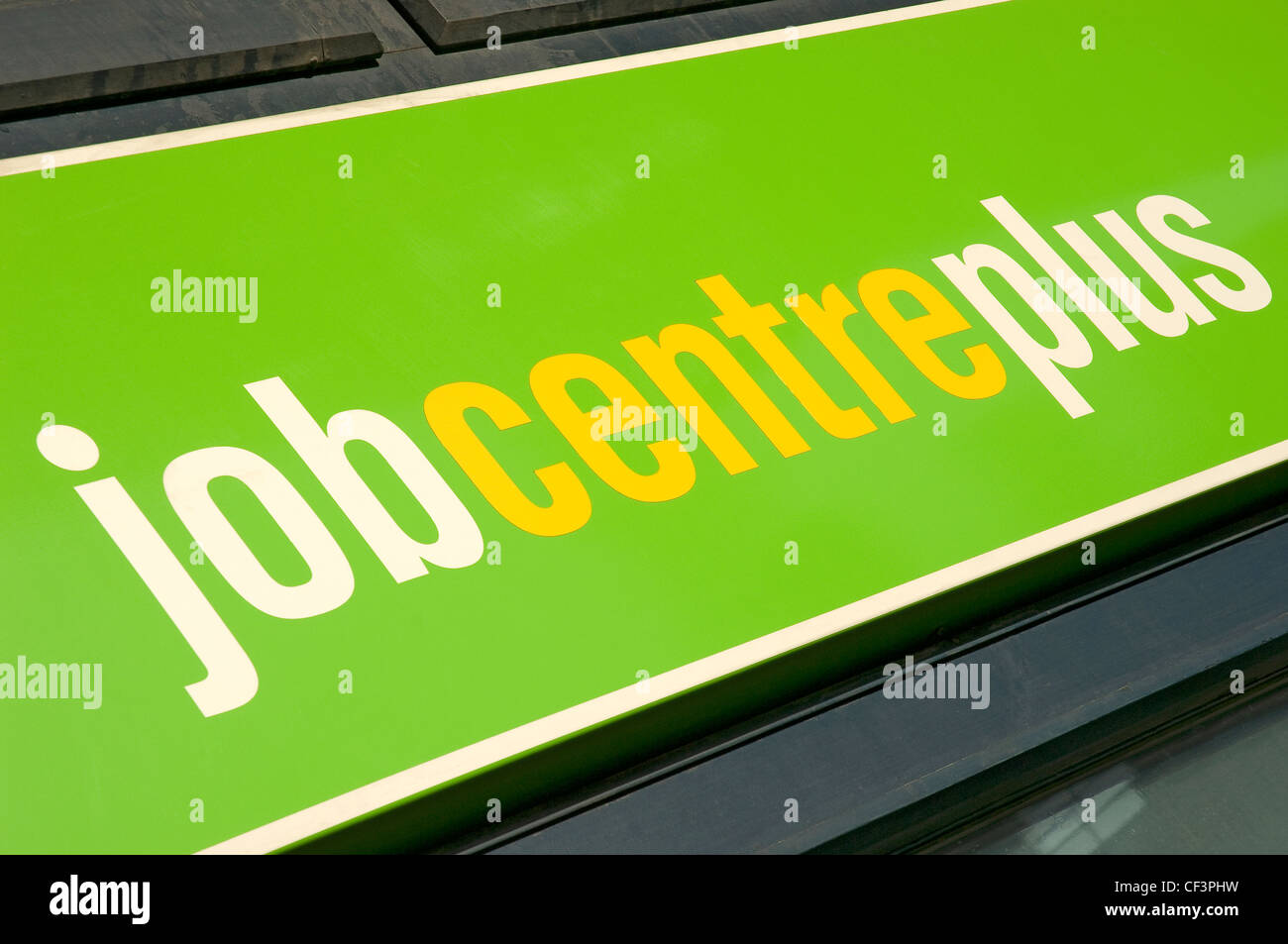 Job centre plus sign above the entrance to a job centre Stock Photo - Alamy