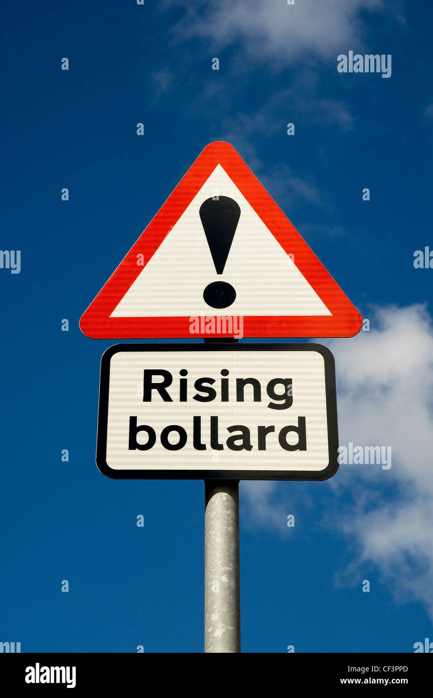 A road warning sign that reads Rising bollard Stock Photo - Alamy