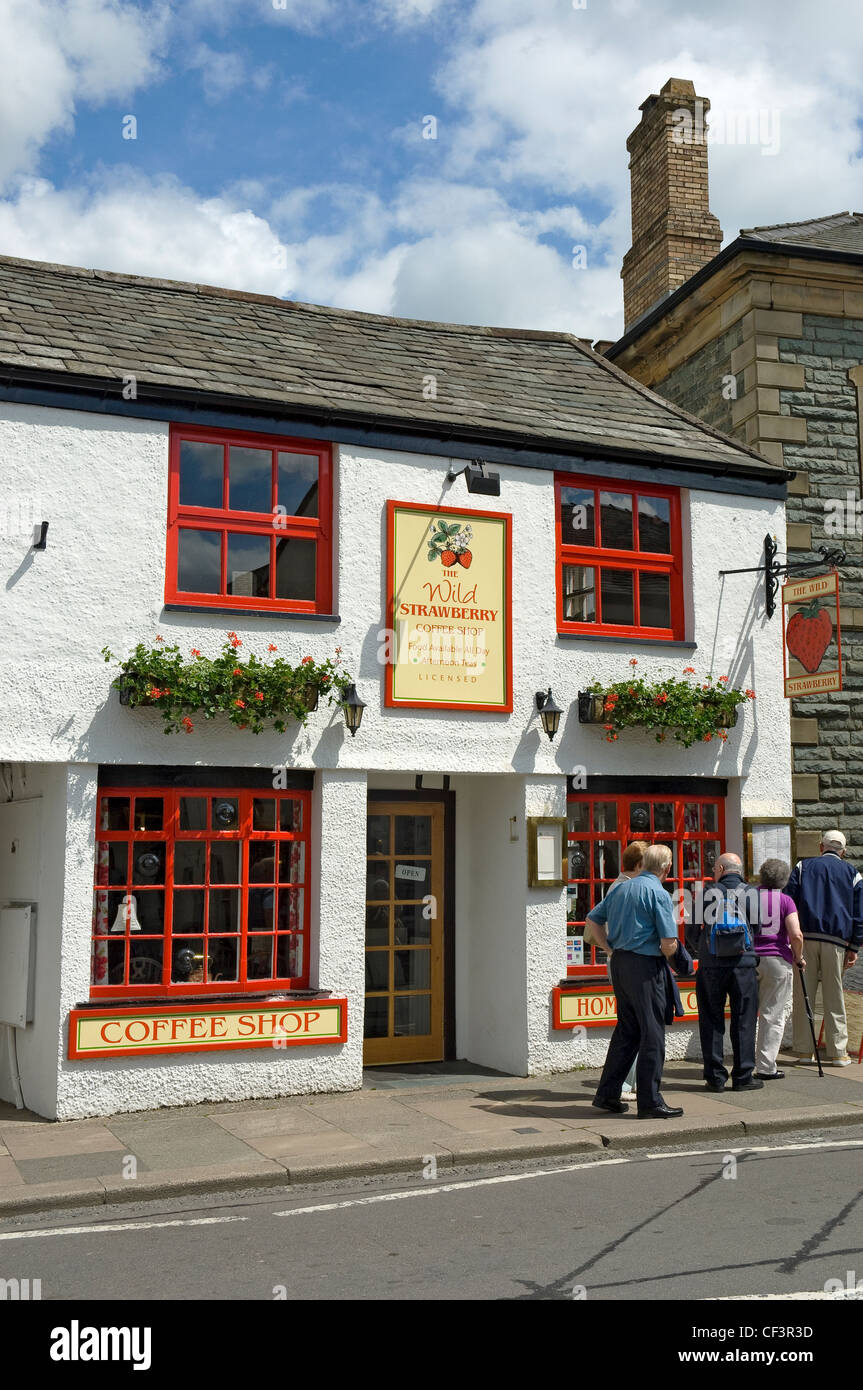 Tourists outside The Wild Strawberry coffee shop, one of the longest ...