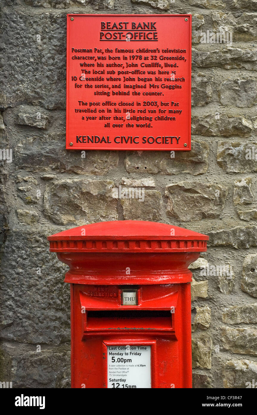 A post box below a plaque outside the old Beast Bank post office Kendal ...