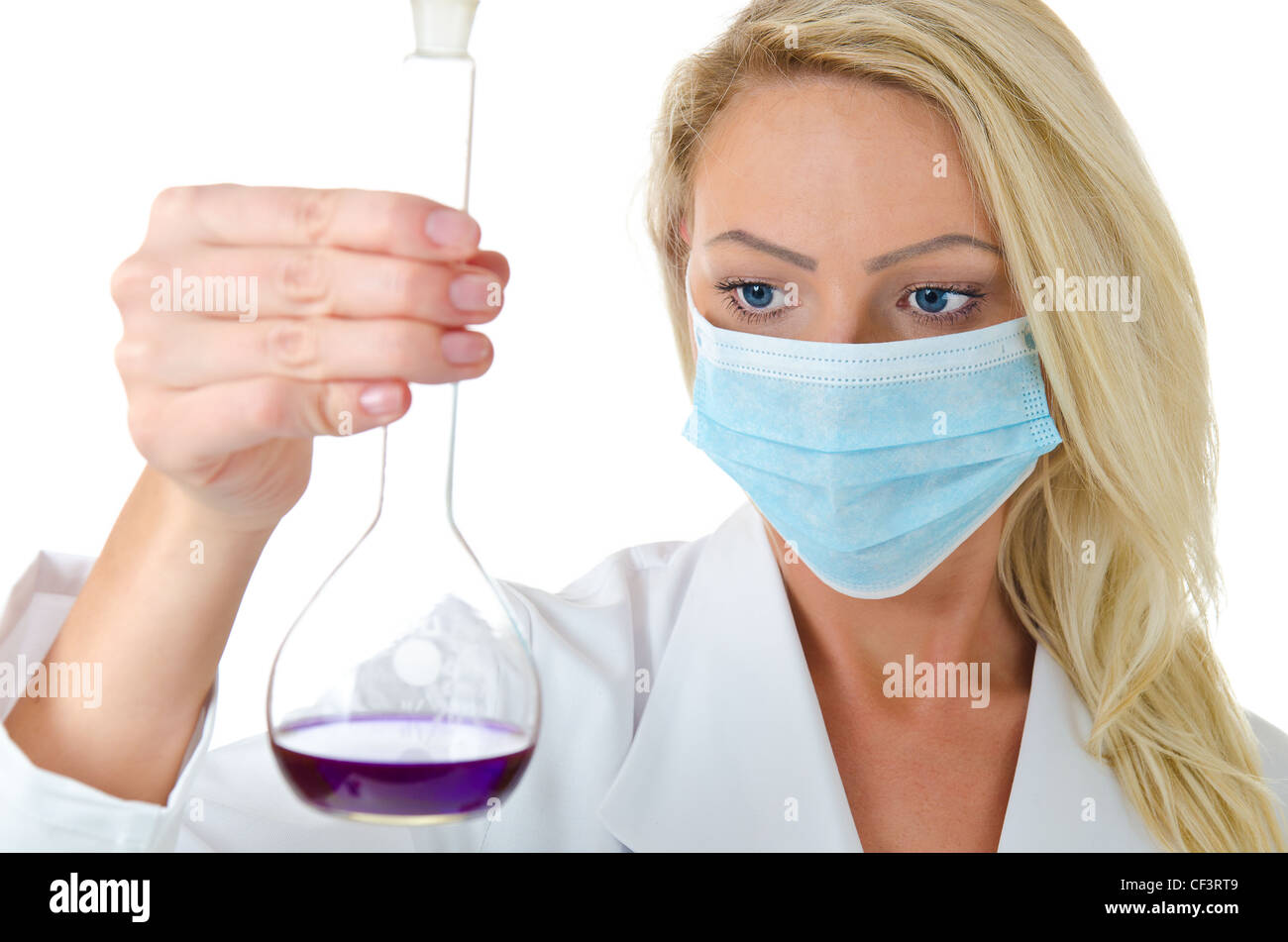 Female scientist mixing chemical solution hi-res stock photography and ...