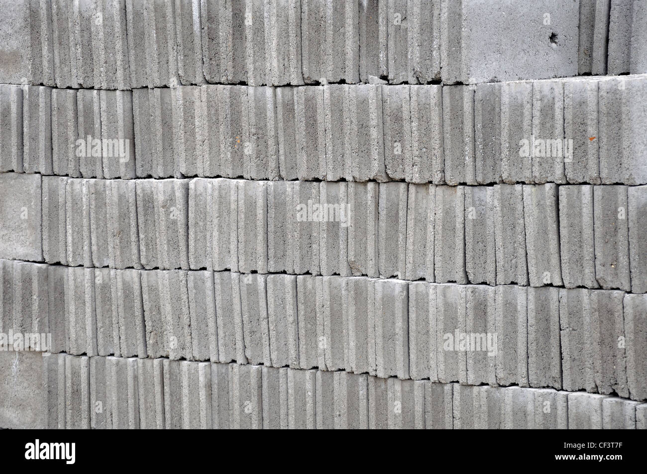 Grey bricks used for building a house Stock Photo - Alamy