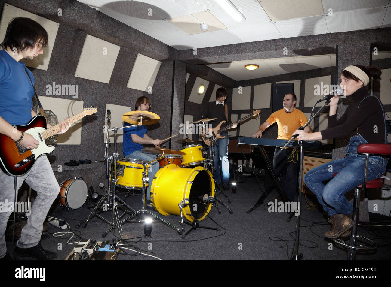 a rock band. vocalist girl, two musicians with electro guitars ...