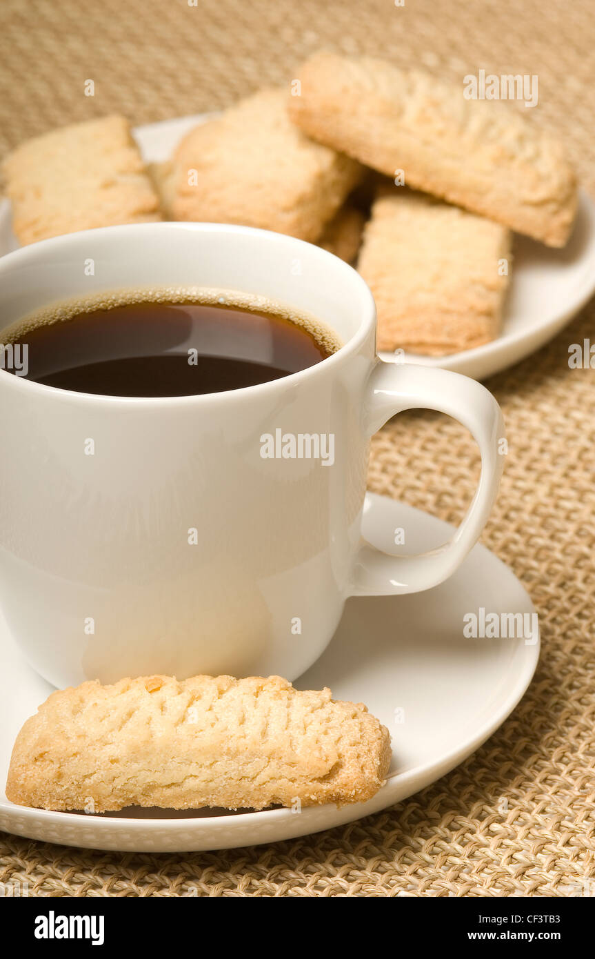 Cup of black coffee and Scottish shortbread biscuits Stock Photo - Alamy