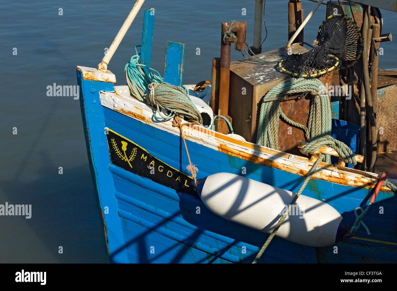 Bow detail on fishing trawler moored in the harbour Stock Photo - Alamy