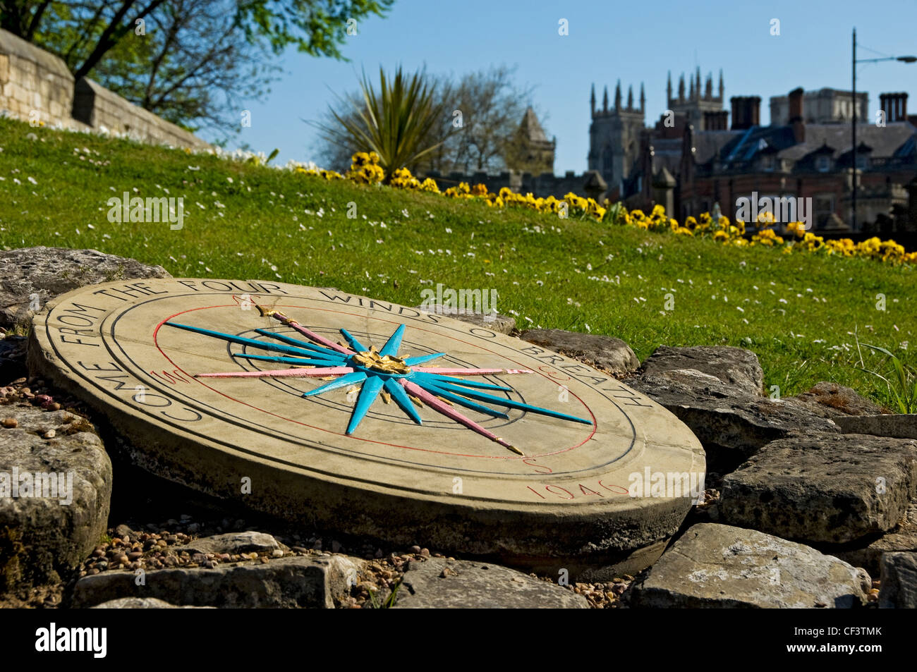 Stone compass adjacent to the City Walls Stock Photo - Alamy