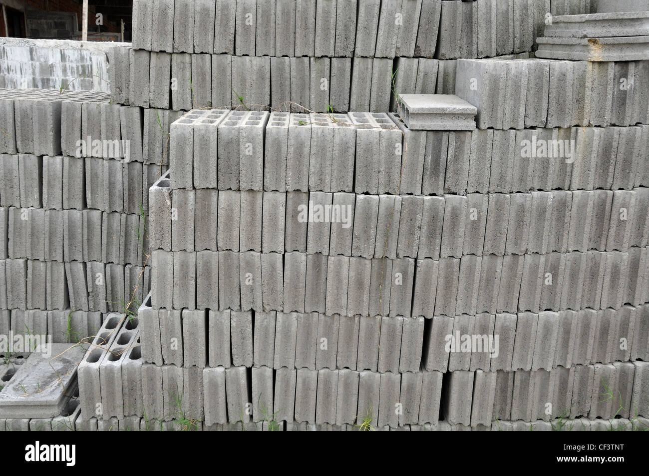 Grey bricks used for building a house Stock Photo - Alamy