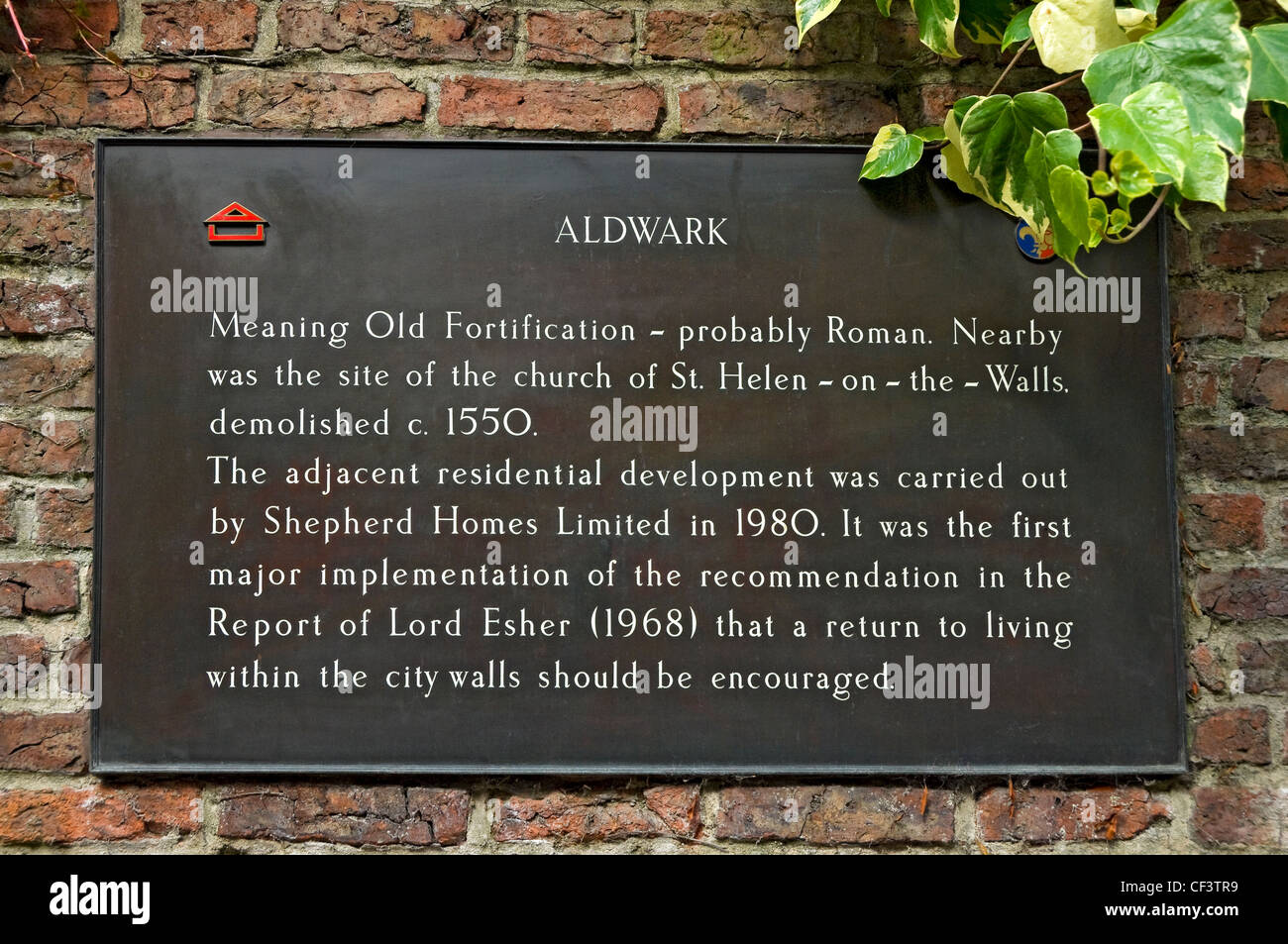 Historical information bronze plaque on the city walls in Aldwark Stock ...