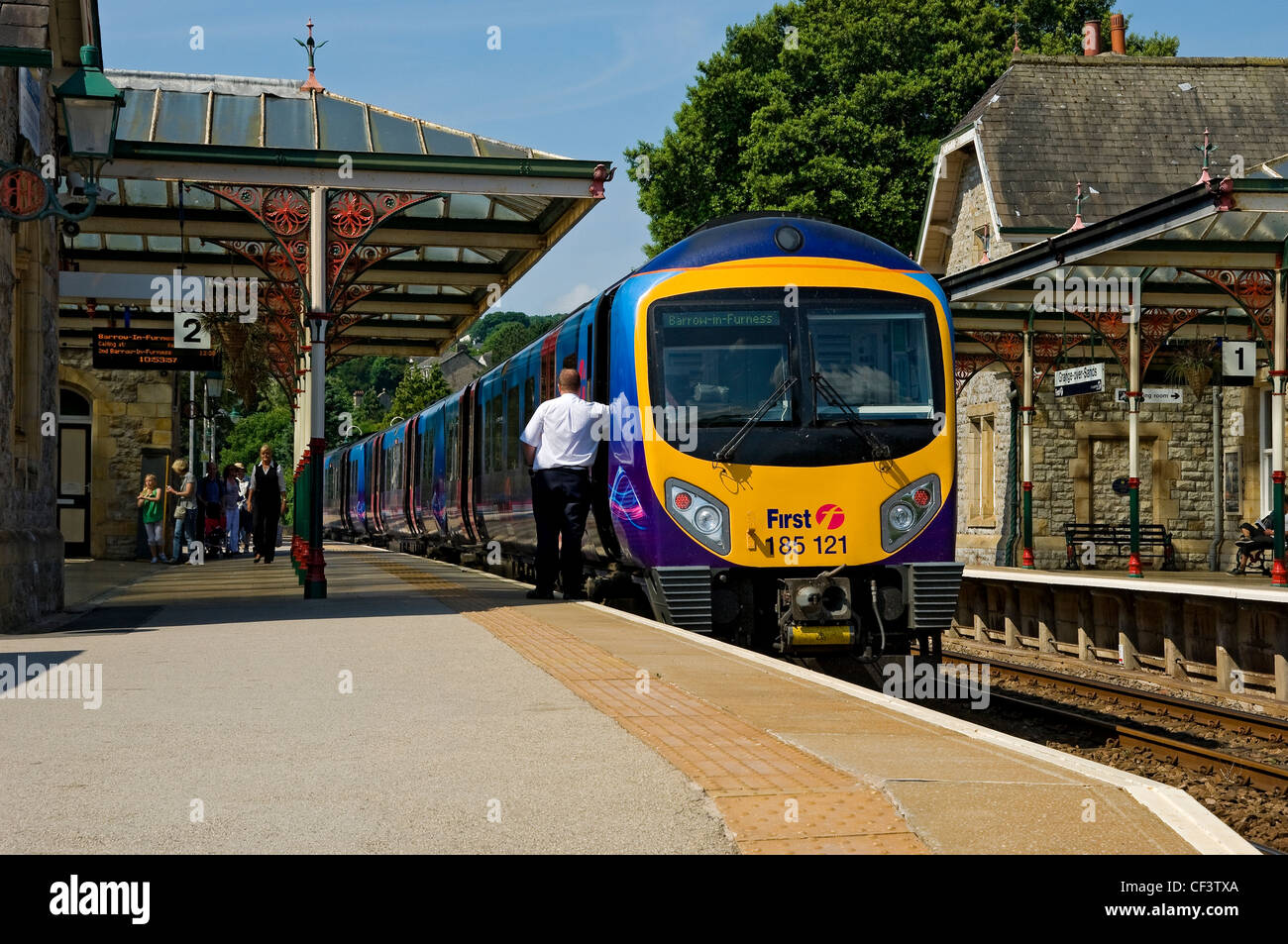 A First TransPennine Express train waiting to depart Grange-over-Sands ...