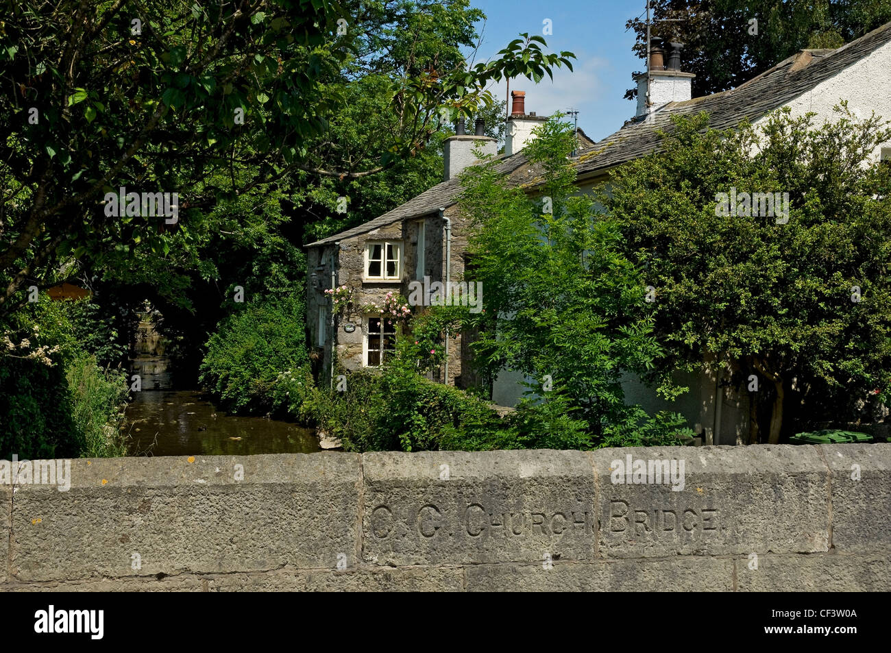 Cottage next to the River Eea Stock Photo - Alamy