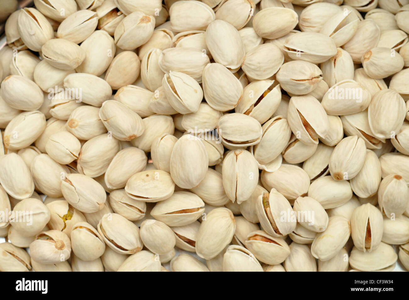 Pistachio Nuts Snack Pieces as a Big Pile Stock Photo - Alamy