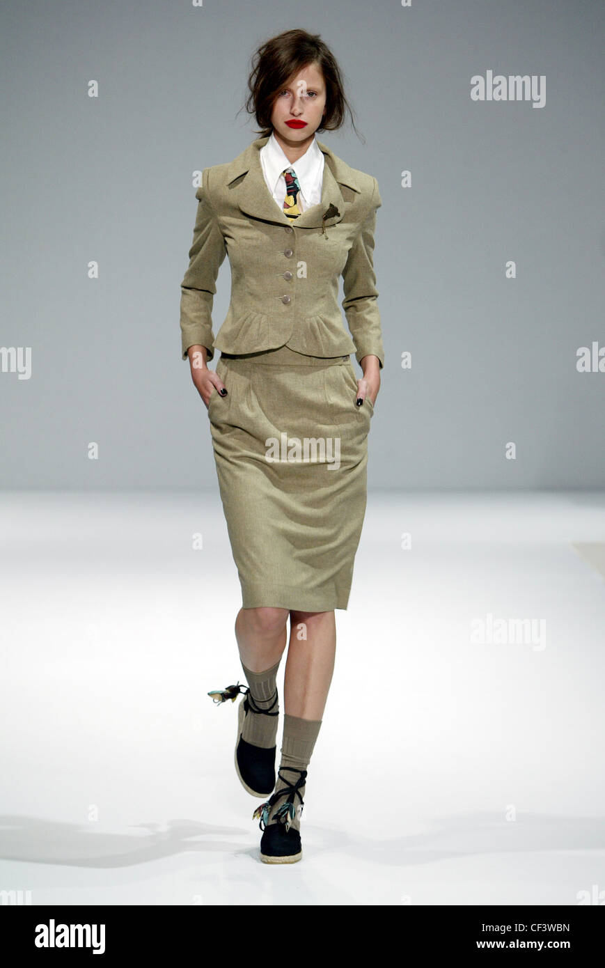 Karen Walker London Ready To Wear Spring Summer Model messy brunette ...