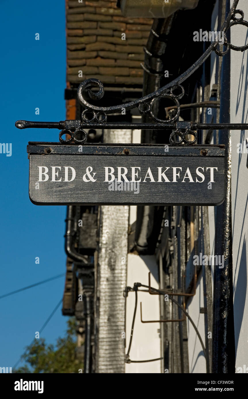A bed & breakfast sign hanging outside a pub Stock Photo - Alamy