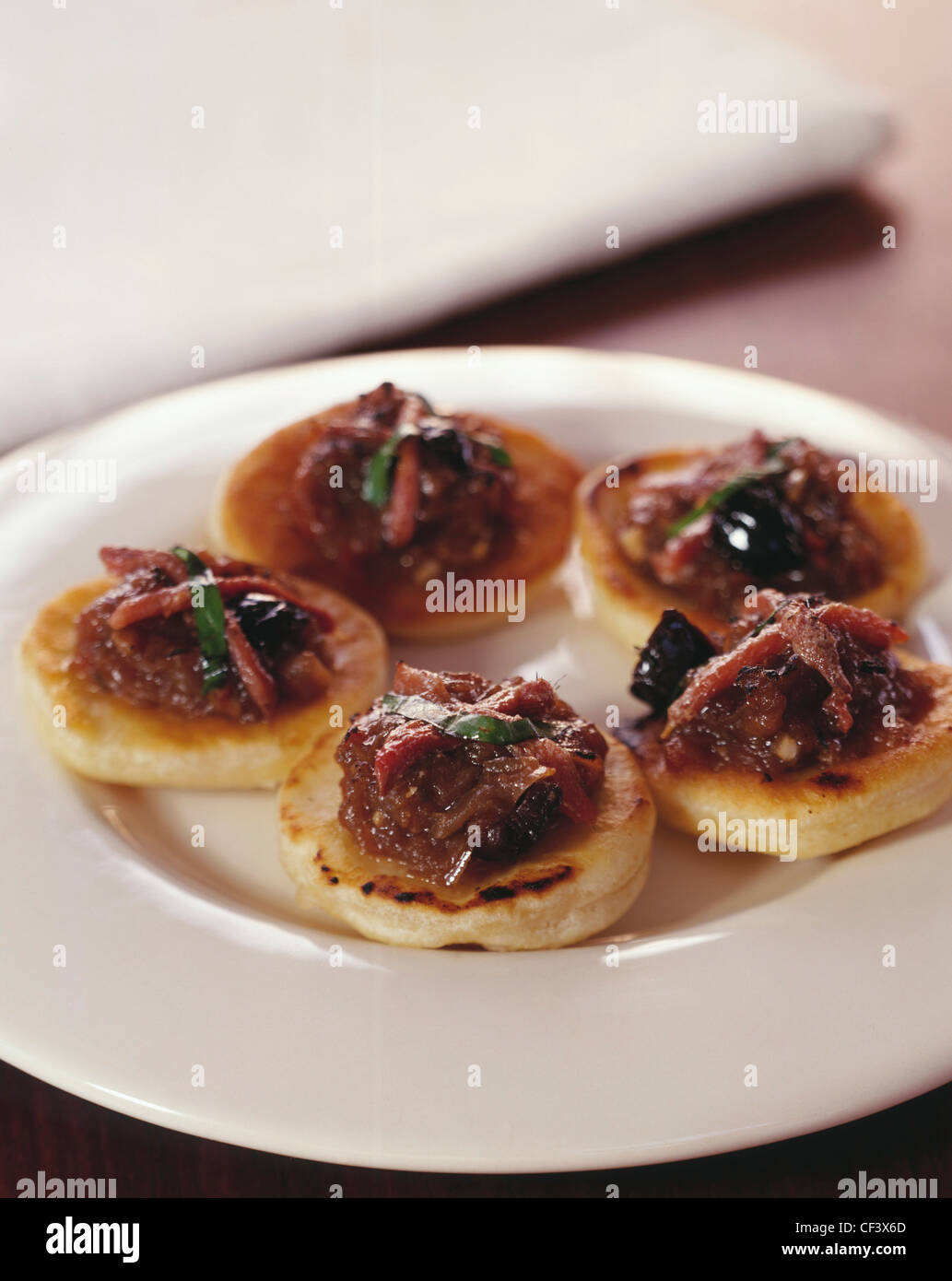 How to create the perfect canapes Red onion pissaladiere, pizza style ...