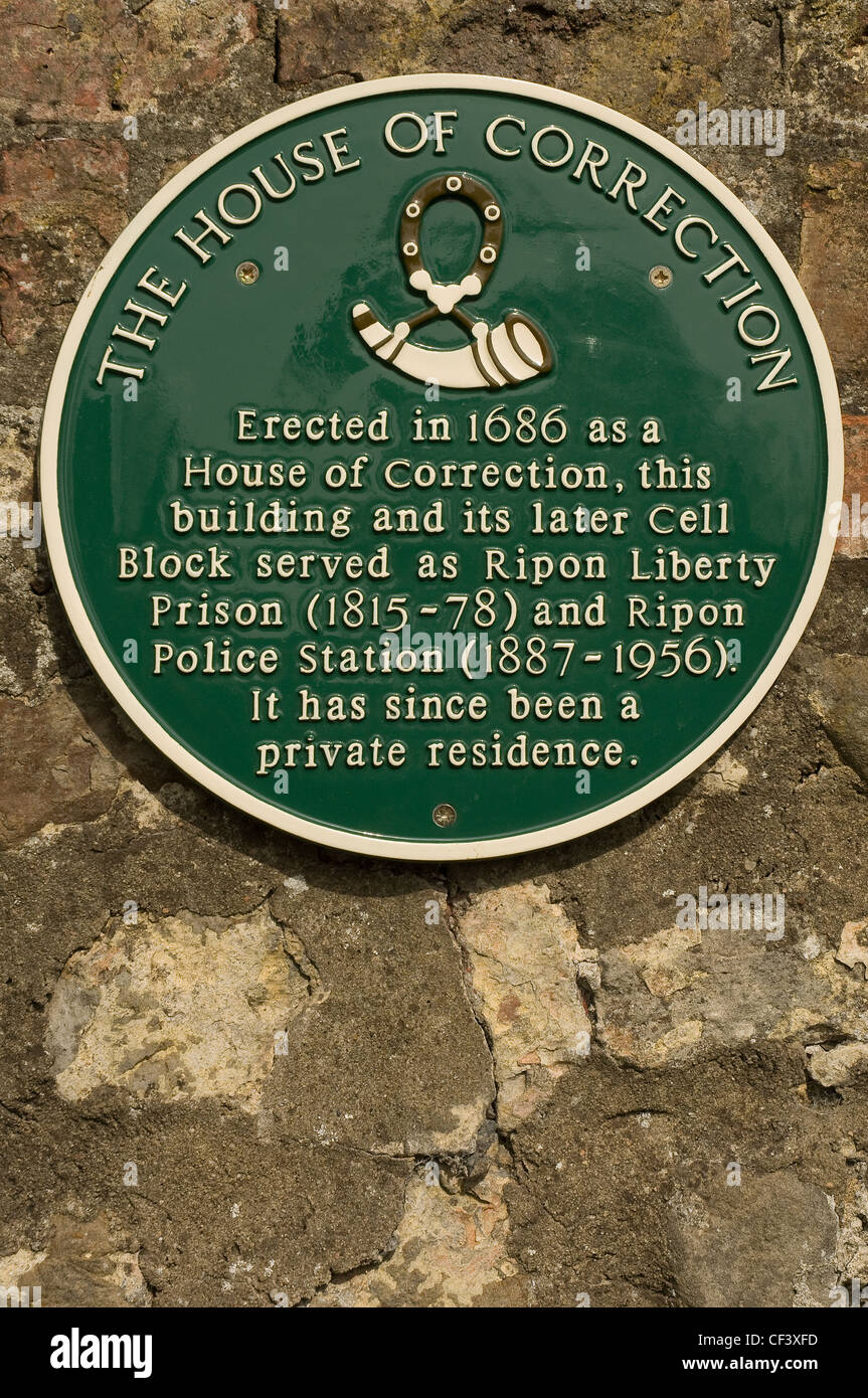 Plaque outside a house stating that the building was built in 1686 as a ...
