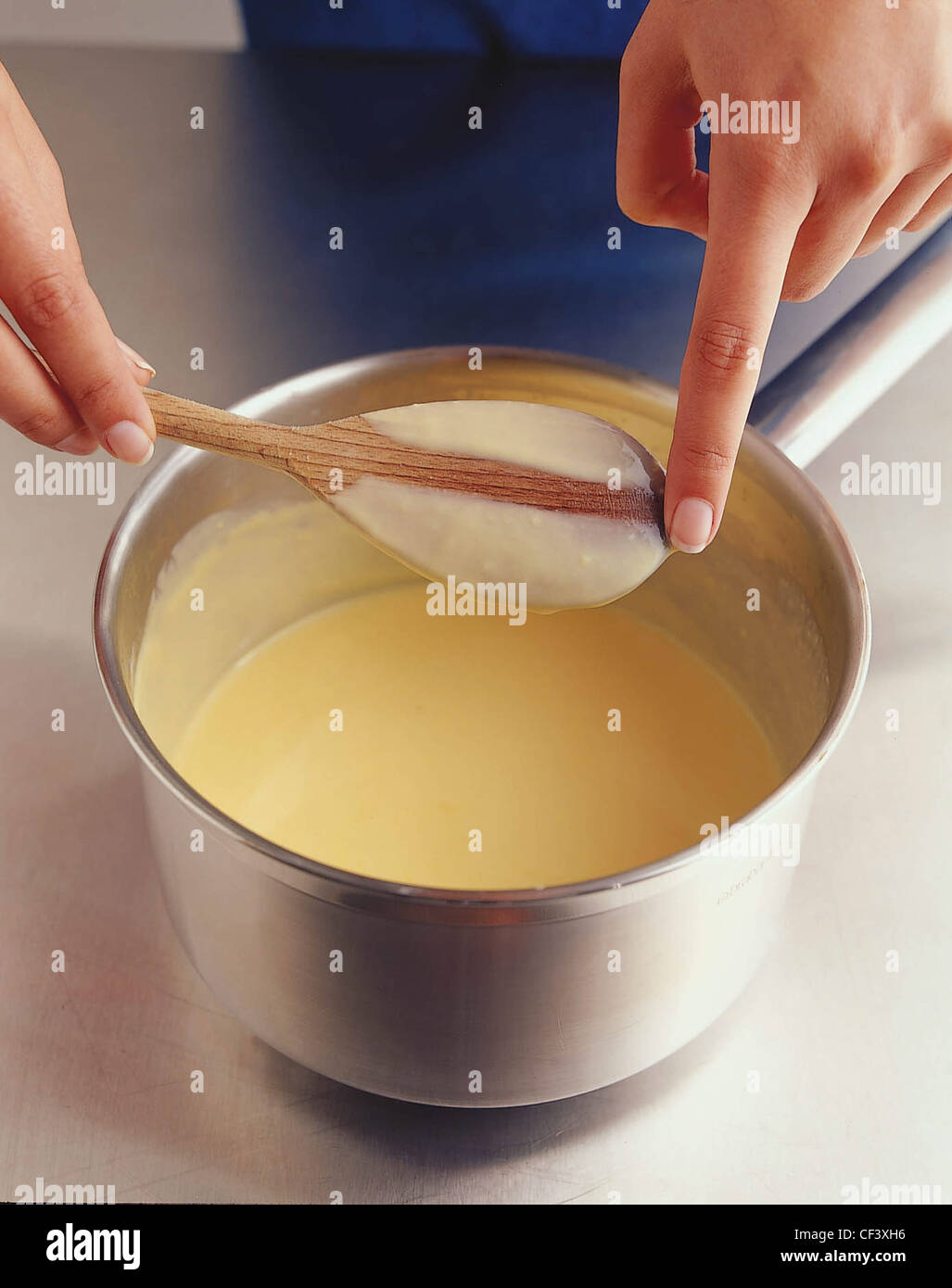 "Step by Step strawberry charlotte" Making custard Stock Photo - Alamy
