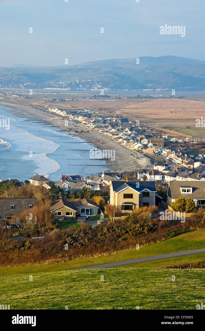 View over the coastal village of Borth with the River Dyfi estuary in ...