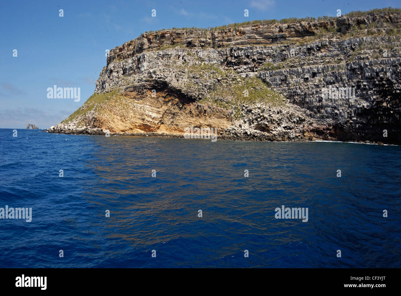 Darwin's Arch and rocky cliffs of the coast of Darwin Island, Galapagos ...