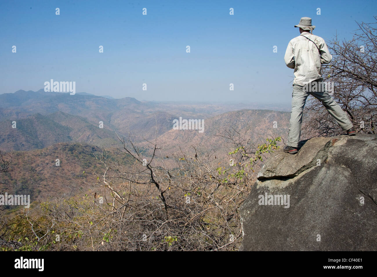 A hiker looks at a view Stock Photo - Alamy