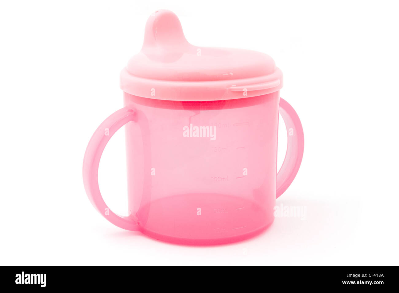 Pink baby cup on a white background Stock Photo - Alamy
