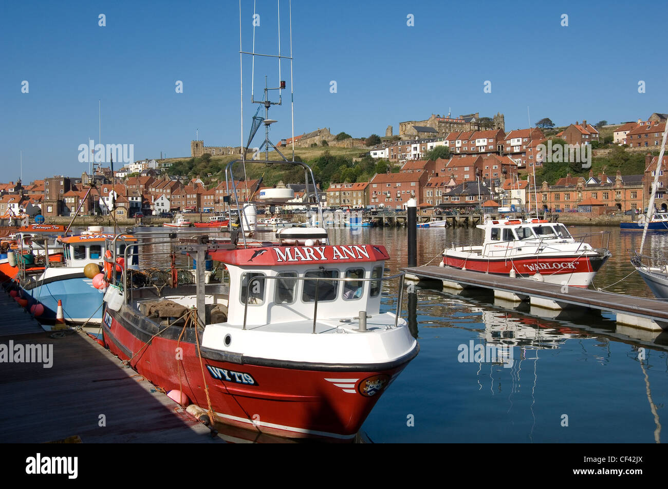 A view of the fishing boats moored at Whitby Harbour Stock Photo - Alamy