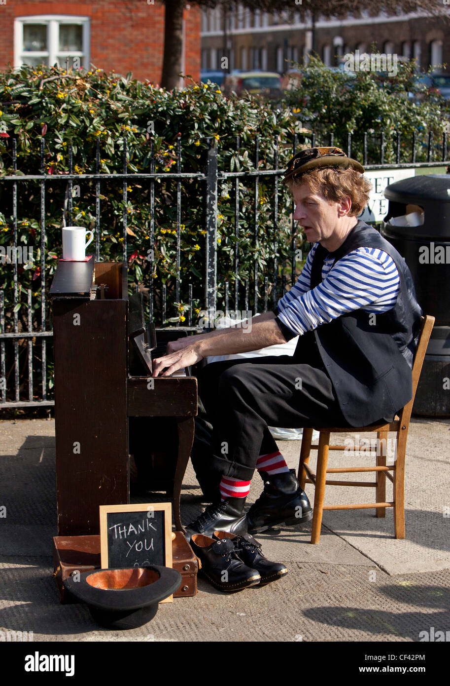 Male busker busking hi-res stock photography and images - Alamy