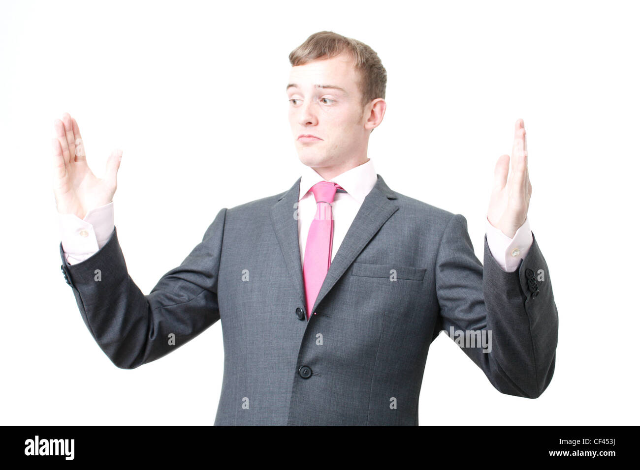 A business man bragging about the size of something Stock Photo - Alamy