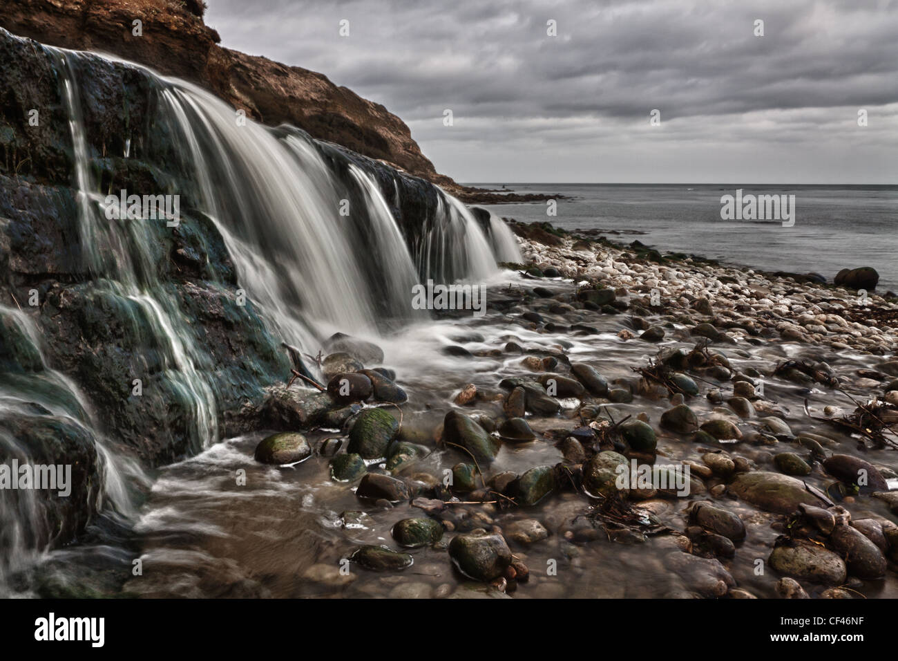 Osmington Mills Waterfall Stock Photo - Alamy