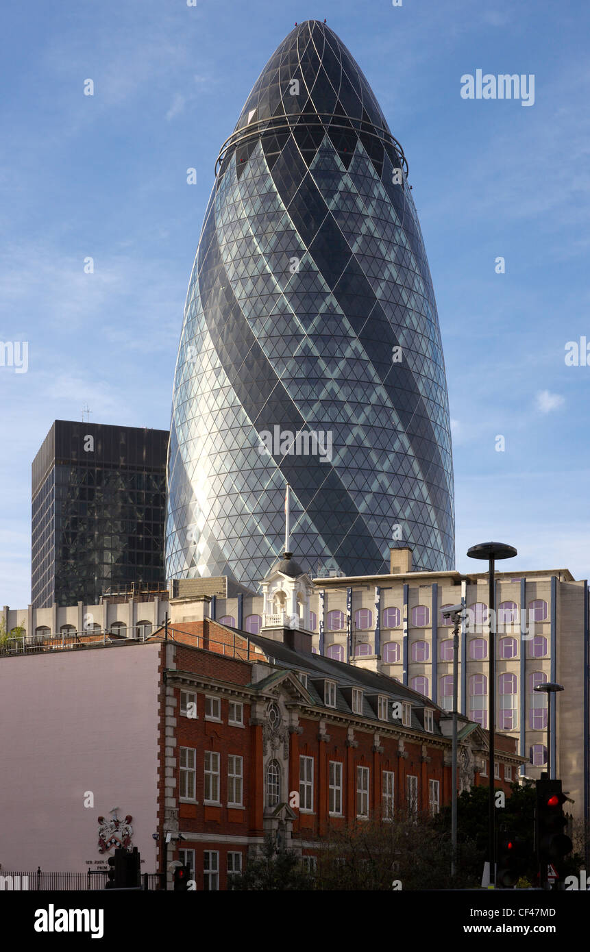 The Gherkin at 30 St Mary Axe in the City of London seen behind older ...