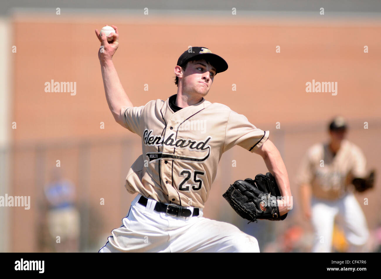 A pitcher delivers a circle change to an opposing hitter during a high ...