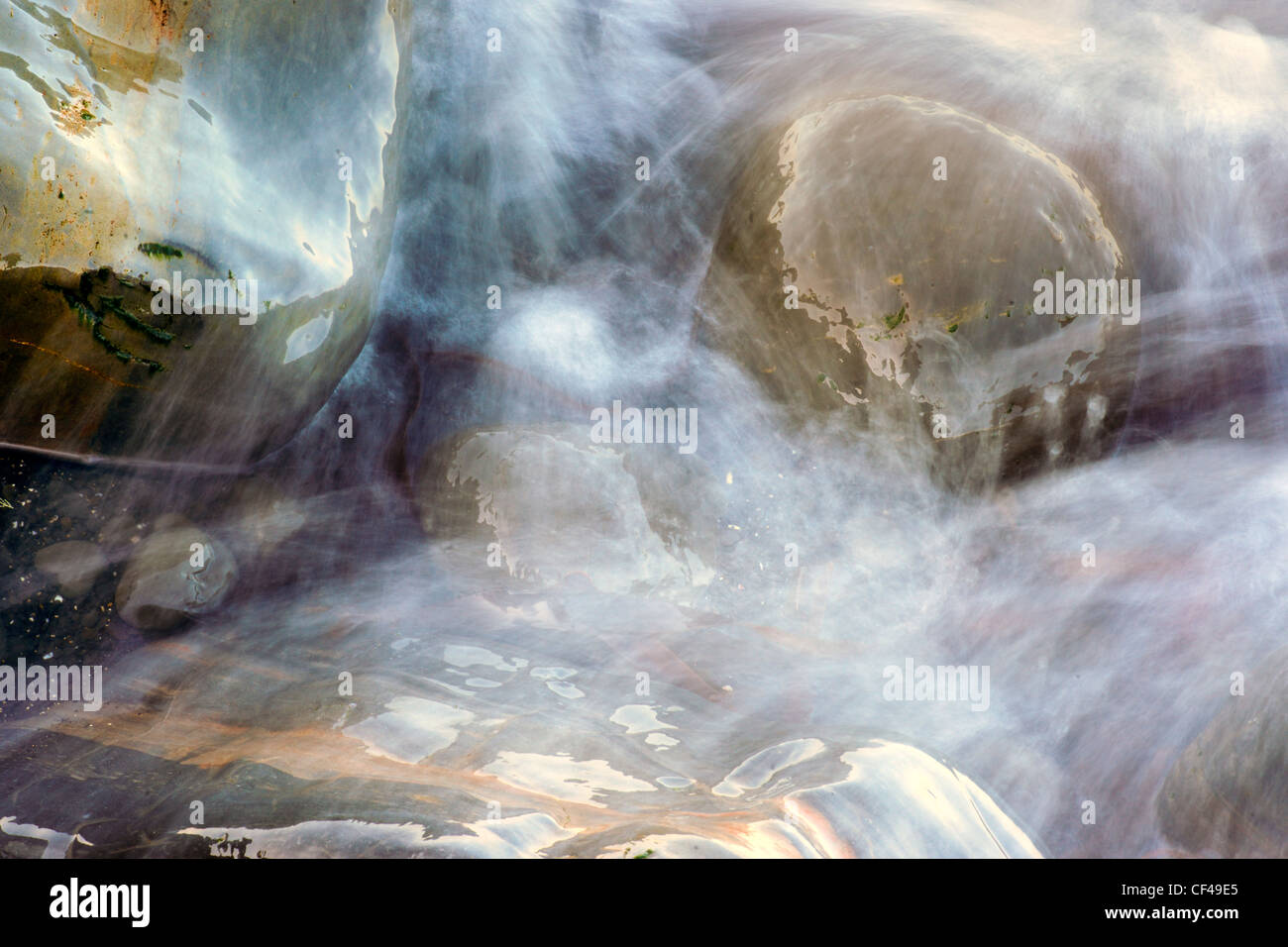 Fast moving water over rocks hi-res stock photography and images - Alamy