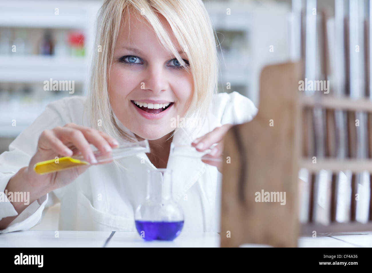 portrait of a female researcher/chemistry student carrying out research ...