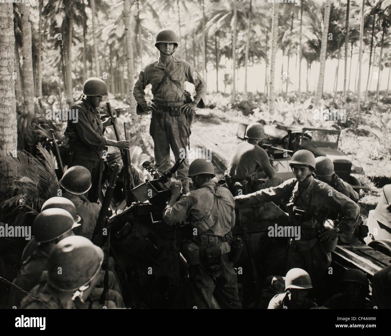 Machine gun is mounted on buffalo beofre patrol (Co. C, 124th Infantry ...