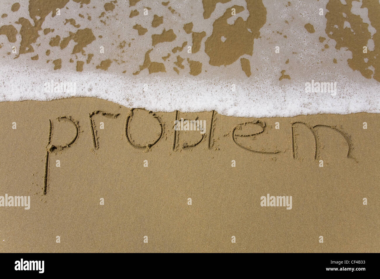 Handwriting word problem written in the sand Stock Photo - Alamy