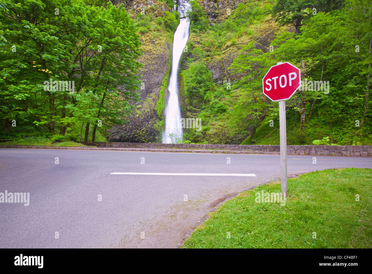 Stop Sign At Corner Of Road And Horse Tail Falls In Columbia River ...