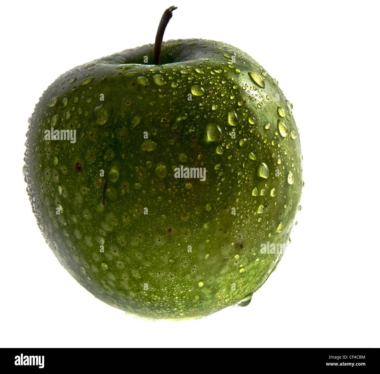 Picture of wet green apple on white background Stock Photo - Alamy