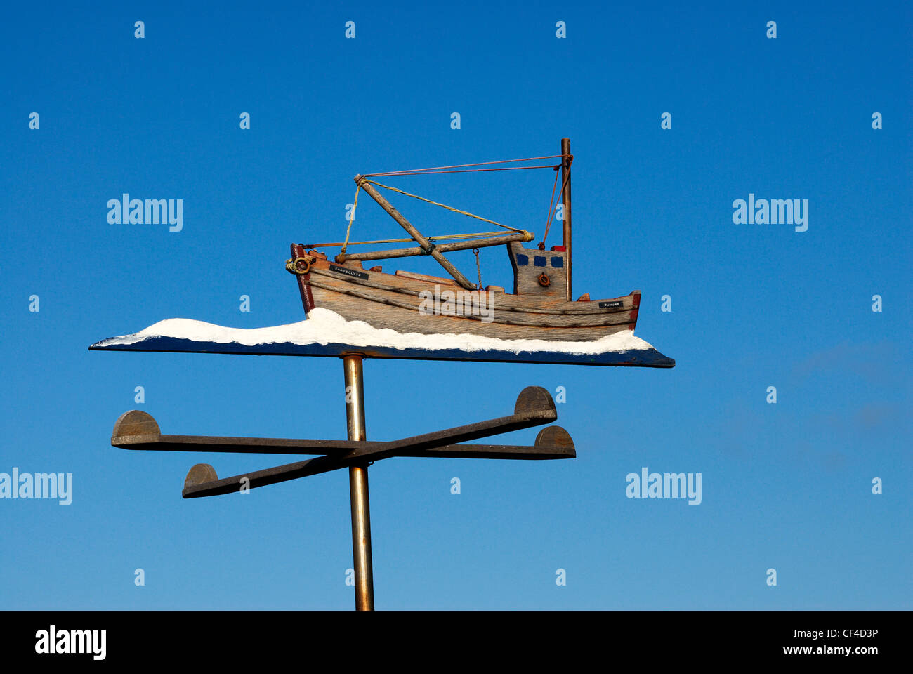 Fishing Boat weather vane Stock Photo - Alamy