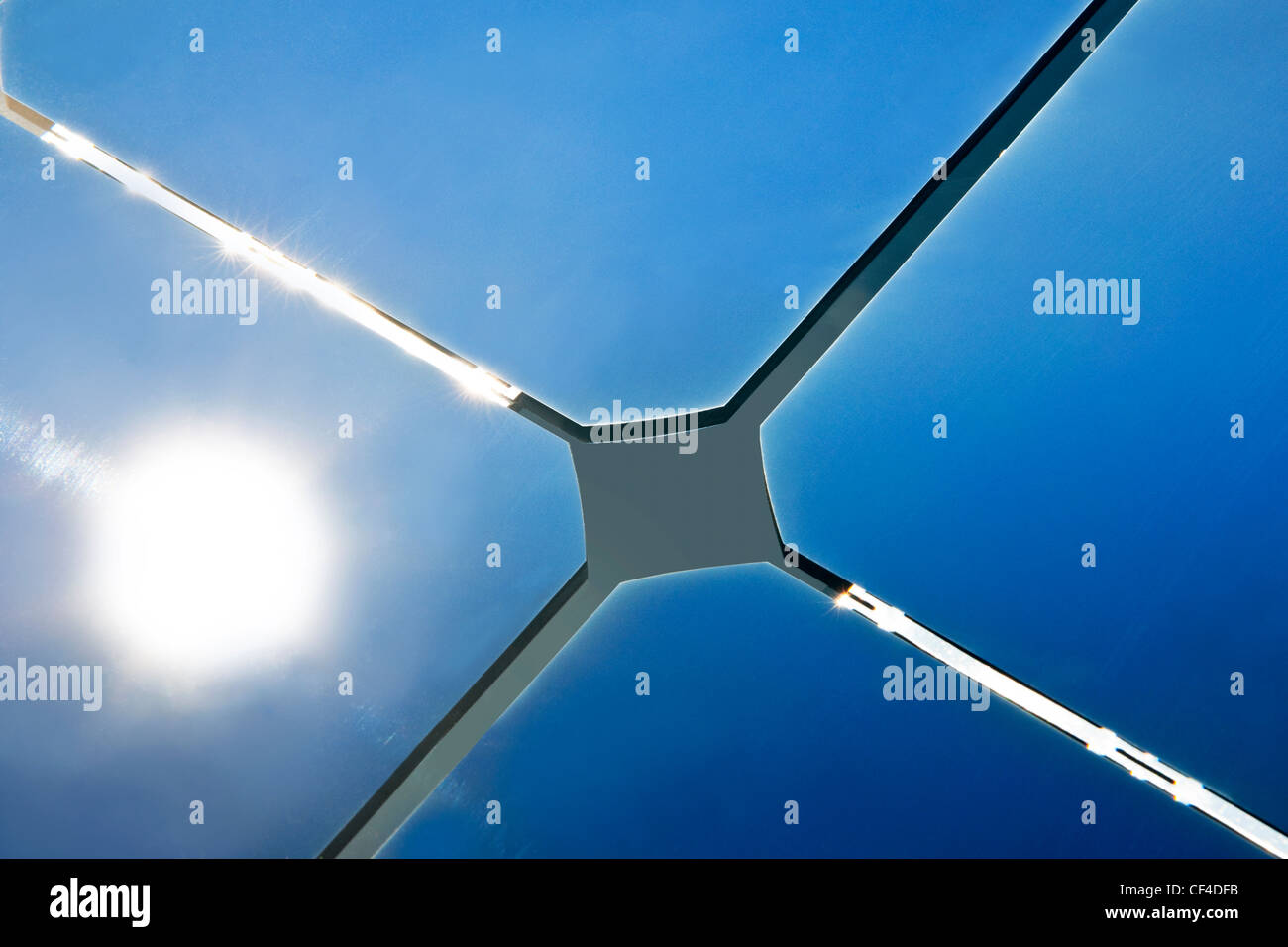 Sun reflecting in high tech photovoltaic solar panels Stock Photo - Alamy