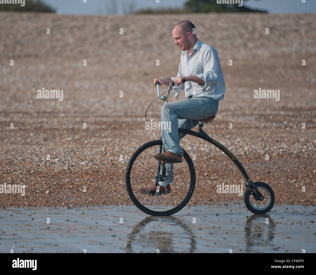 Man penny farthing bicycle in hi-res stock photography and images - Alamy