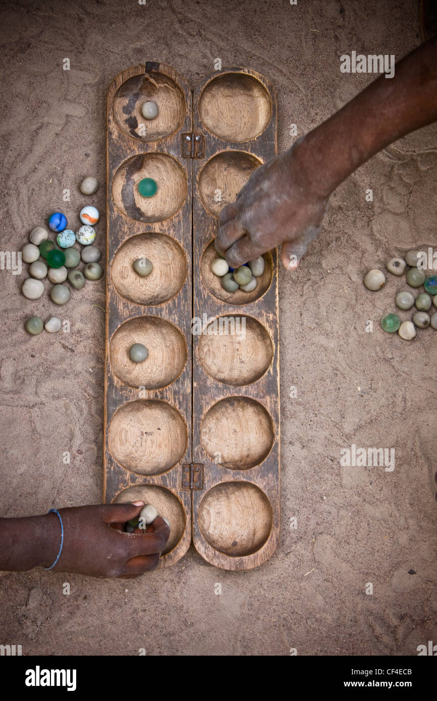 Children playing marble hi-res stock photography and images - Alamy